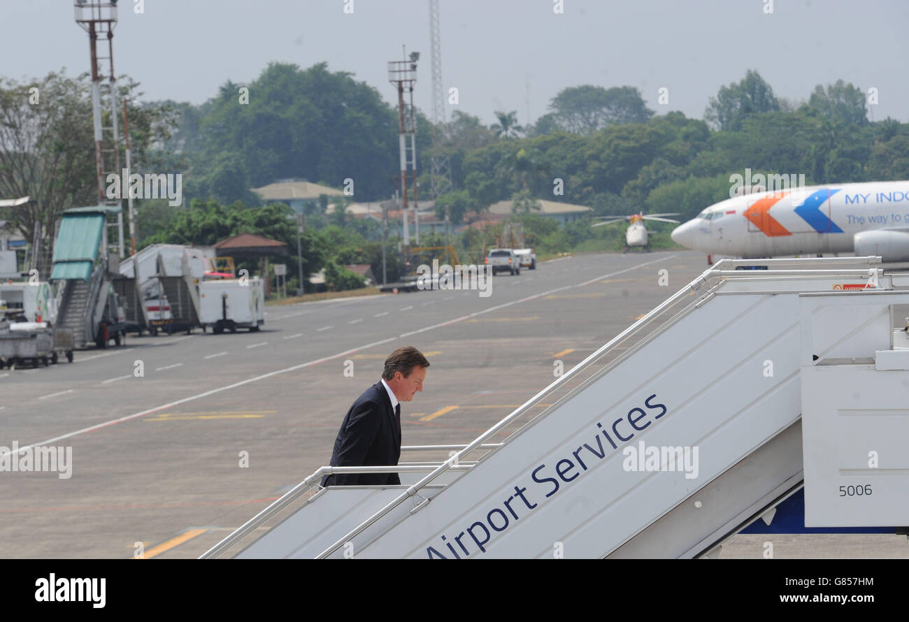 Prime Minister David Cameron boards his plane in Jakarta bound for ...