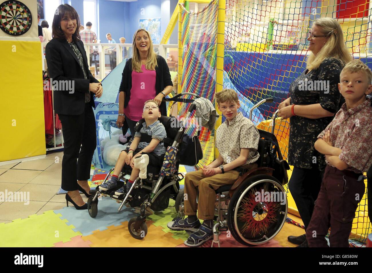Samantha Cameron (left), wife of Prime Minister David Cameron, meets ...