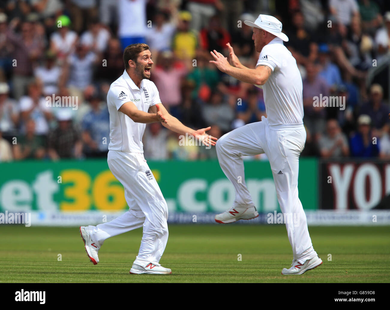 England bowler Mark Wood celebrates taking the wicket of Australia's ...