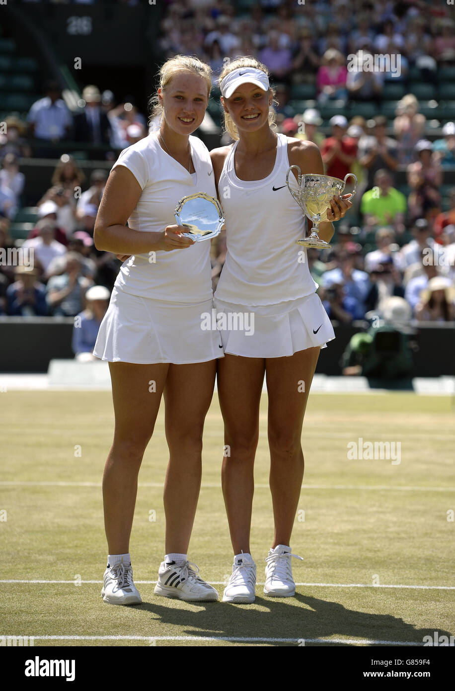 Sofya zhuk celebrates with the girls singles trophy during day twelve ...