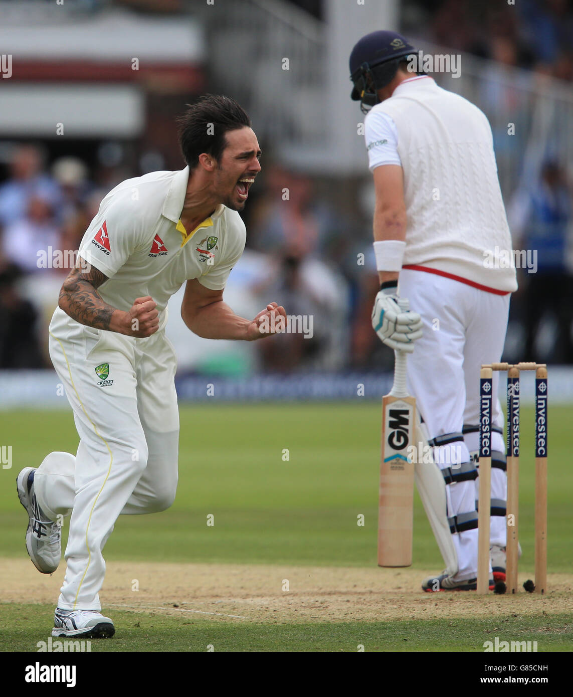 Australia bowler Mitchell Johnson celebrates taking the wicket of ...