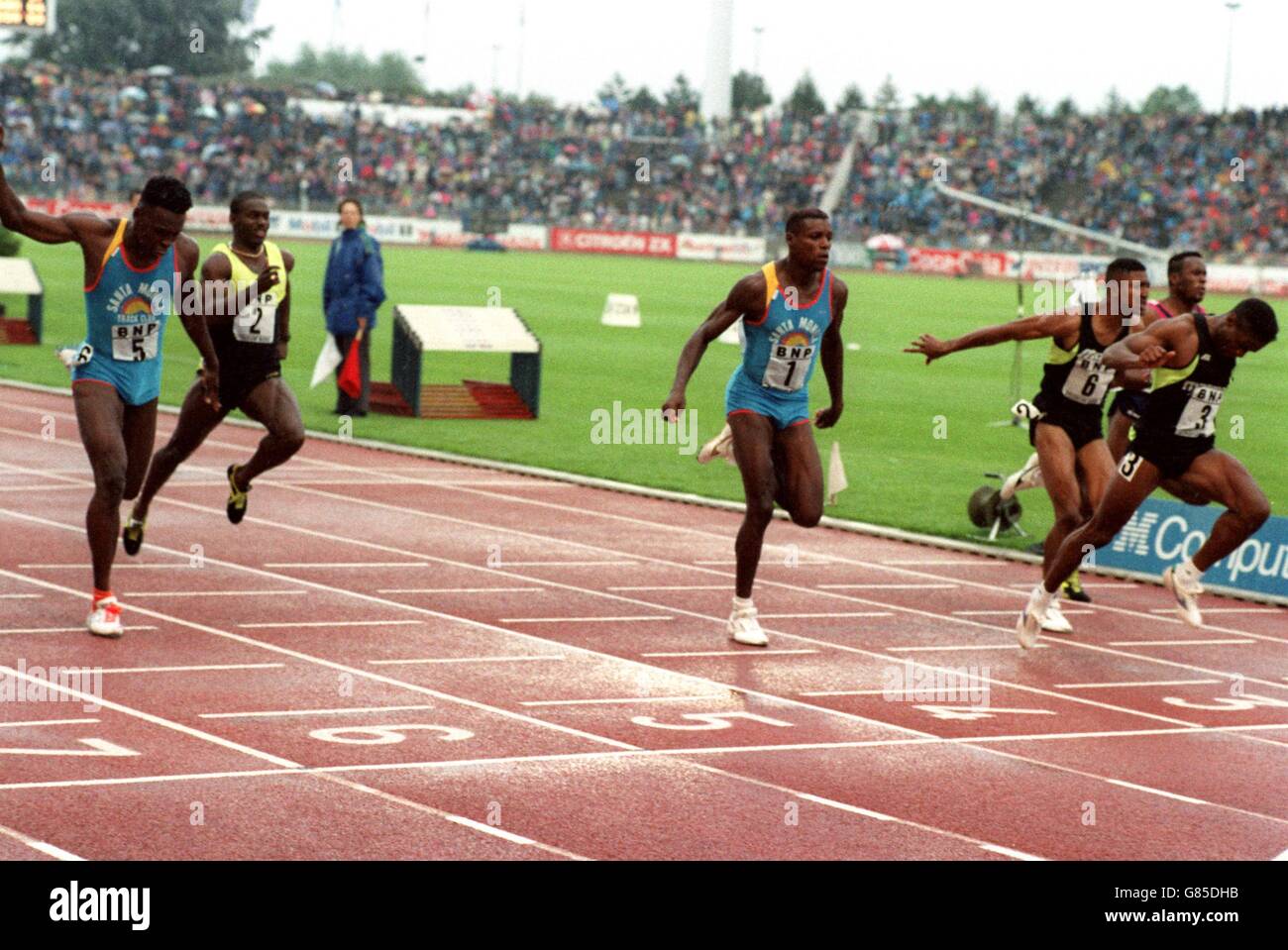 Canada's Ben Johnson (2) trails USA's Carl Lewis (1) and race winner ...