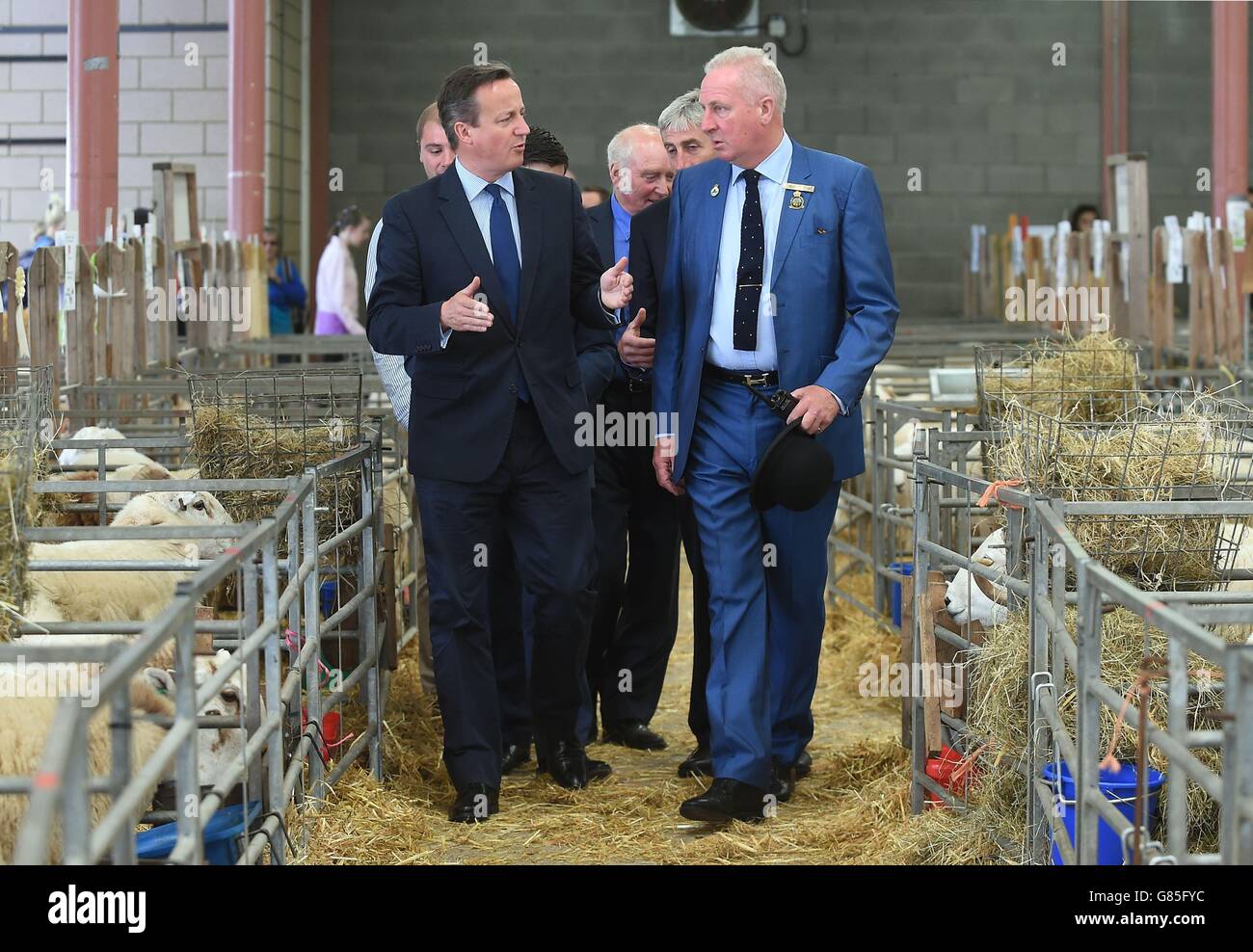 Prime Minister David Cameron (left) is given a tour of the Welsh ...