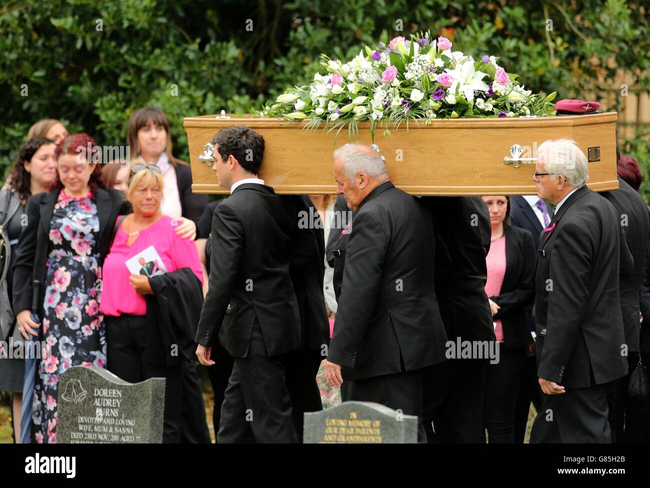 The coffin of Tunisian terror attack victim John Stollery is carried ...
