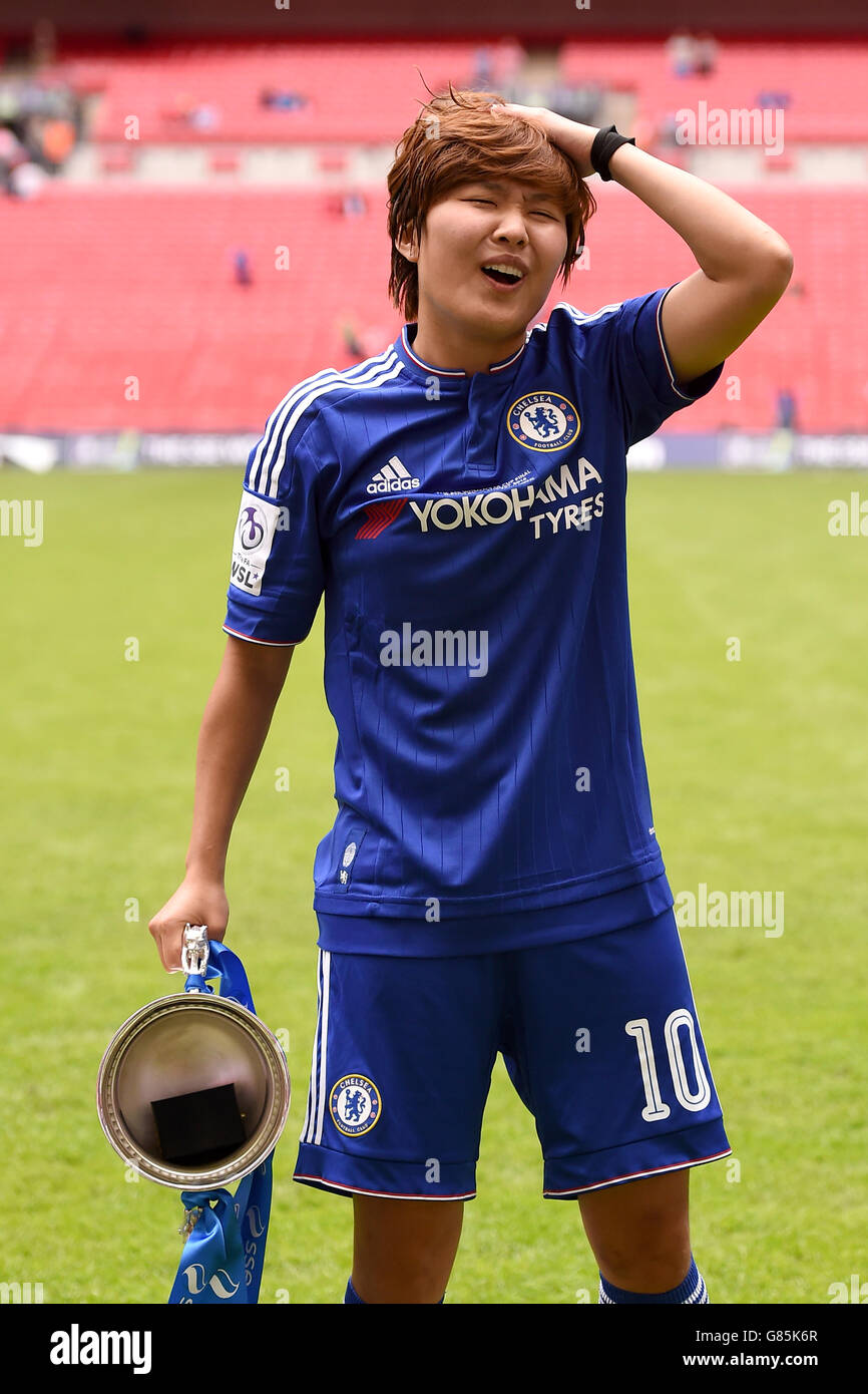 Chelsea's Ji So-Yun celebrates with the trophy at the end of the Women ...