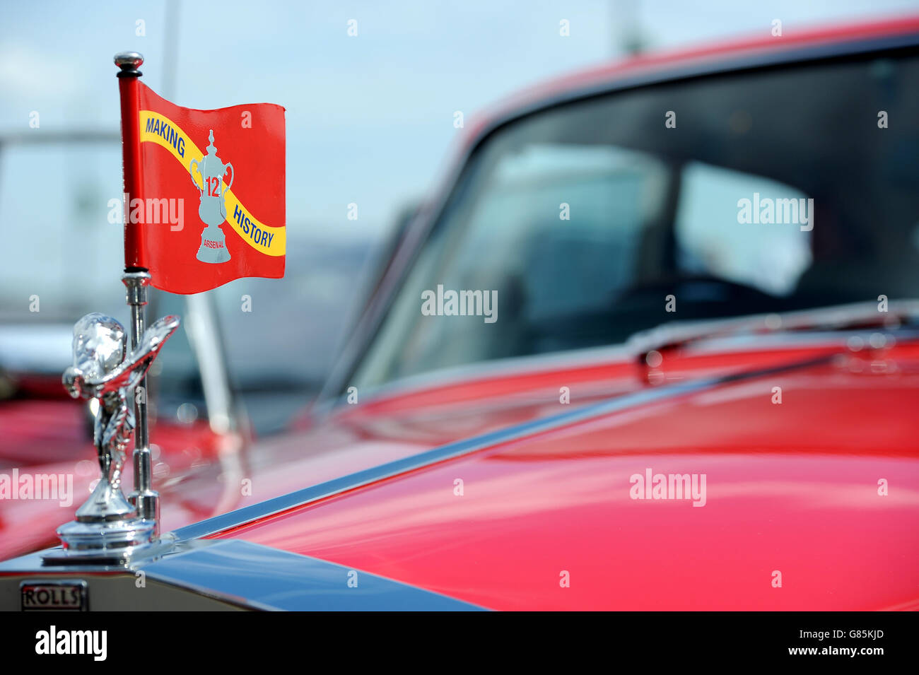 An Arsenal FA Cup winners themed Rolls Royce car in the car park ...