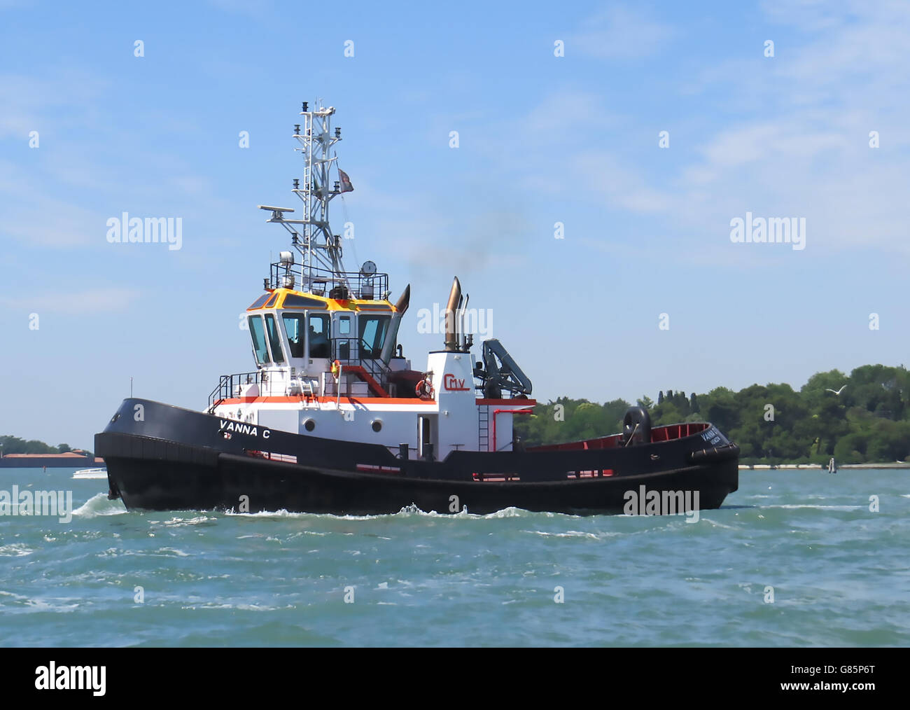 TUG BOAT on the lagoon at Venice, Italy. Photo Tony Gale Stock Photo ...