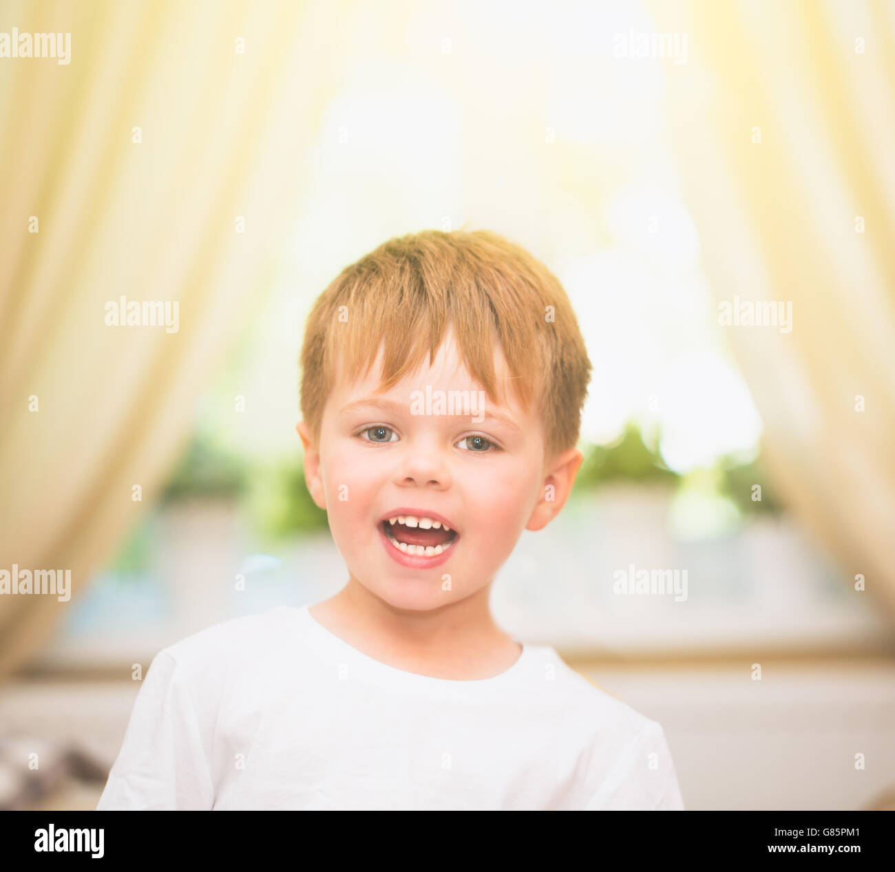 Boy with big toothy smile hi-res stock photography and images - Alamy