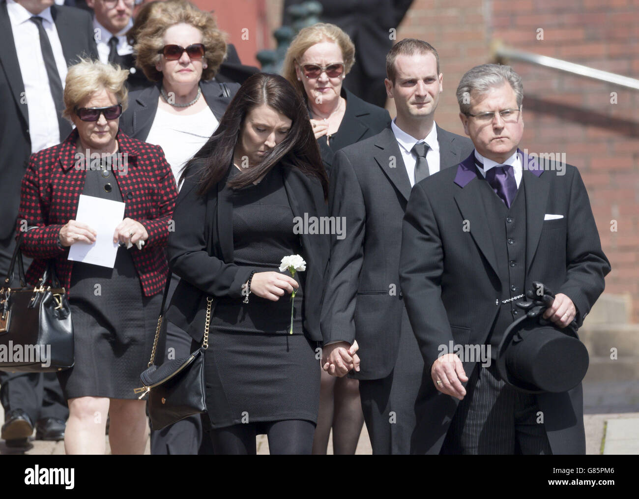 Stuart McQuire (2nd right), with his wife Nicola (3rd right), the son ...