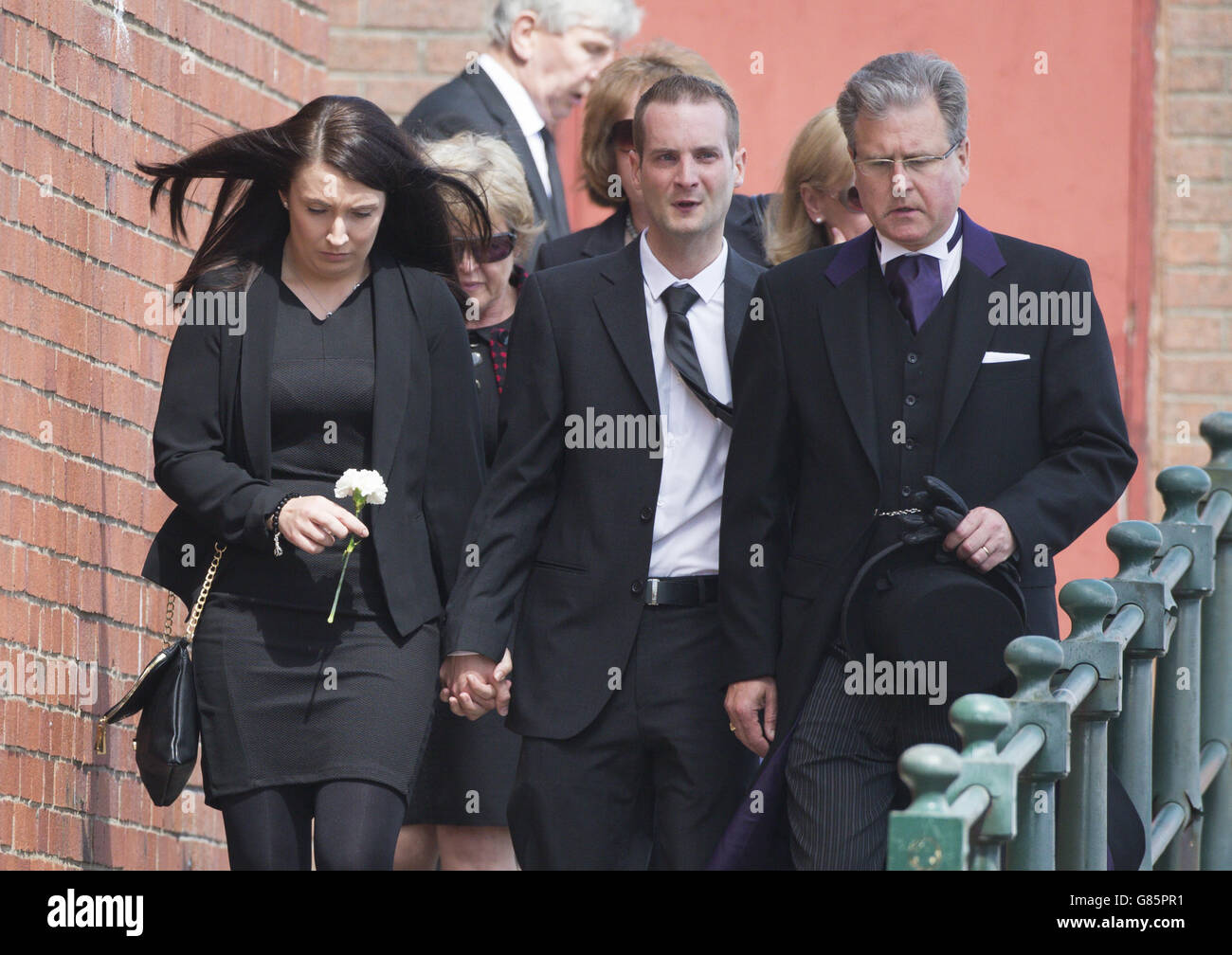 Stuart McQuire (2nd left) and his wife Nicola (left), son of Jim and ...