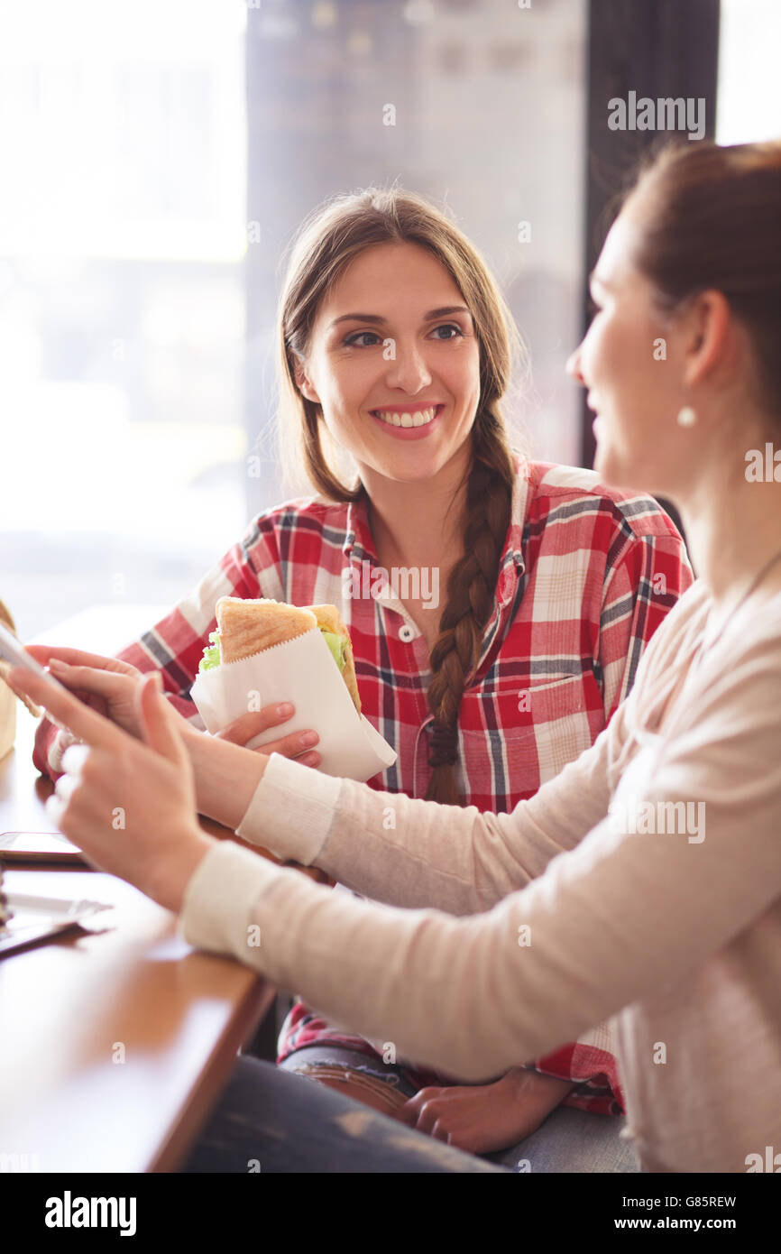 Best friends ladies in cafe Stock Photo - Alamy