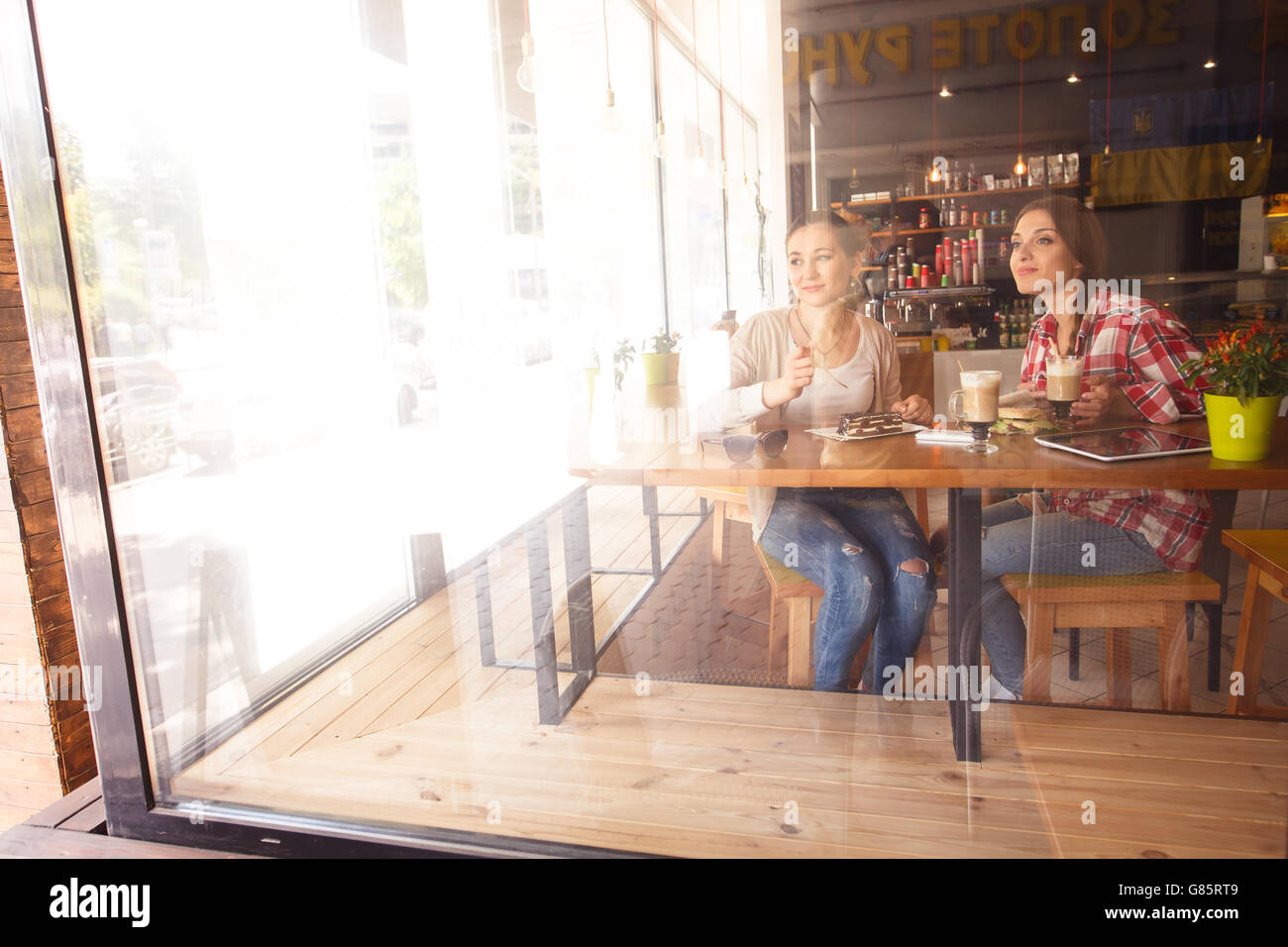 Best friends ladies in cafe Stock Photo - Alamy
