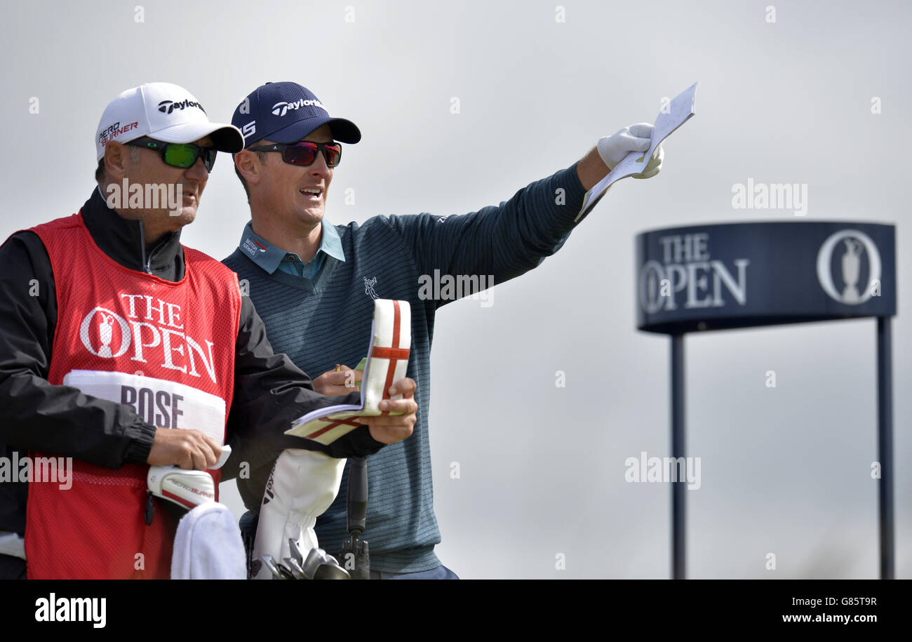 England's Justin Rose with his caddie during day one of The Open ...