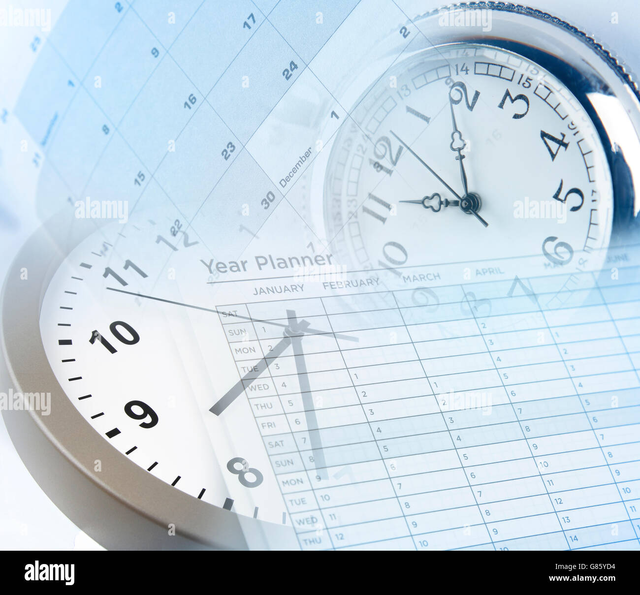 Clocks, calendar page and year planner Stock Photo - Alamy