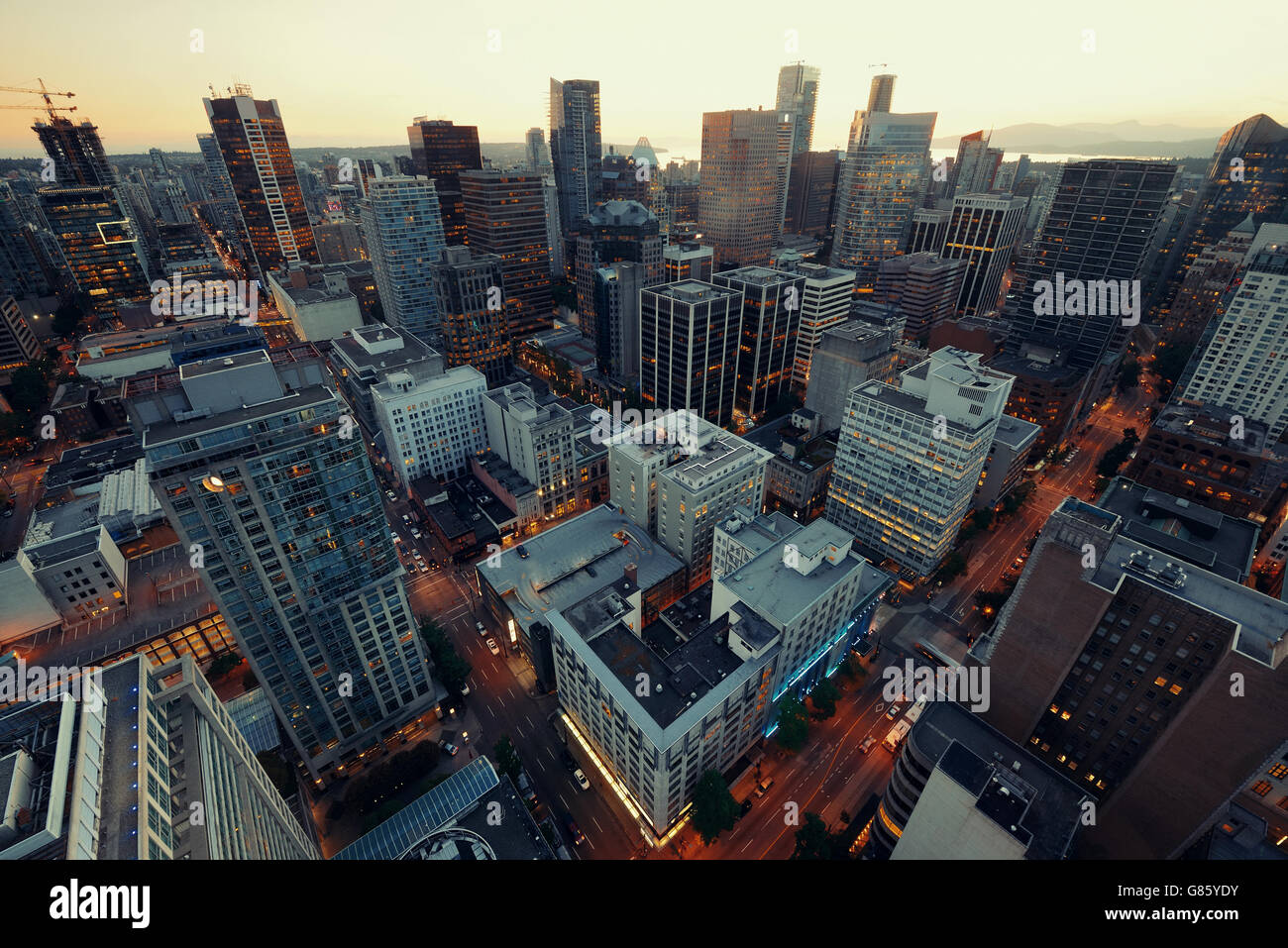 Vancouver rooftop view with urban architectures at sunset Stock Photo ...
