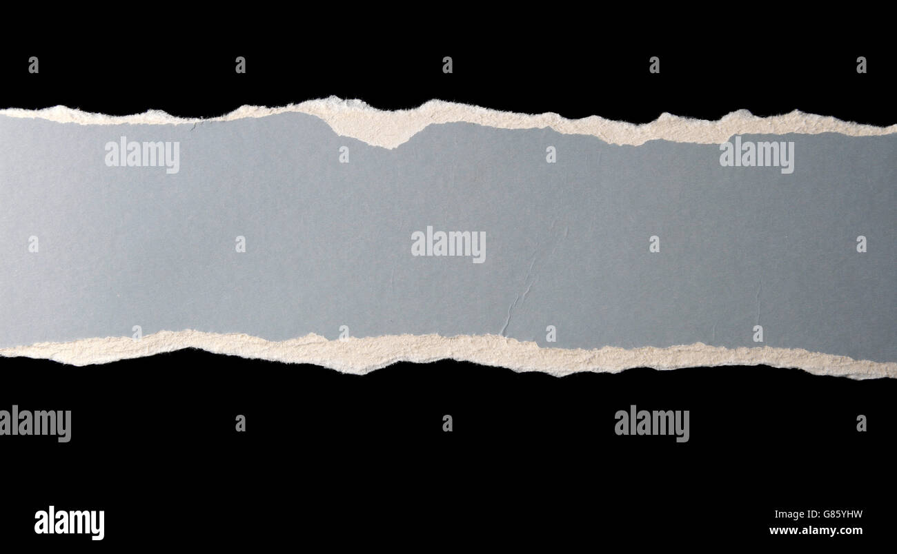 Gap in blue ripped paper Stock Photo - Alamy