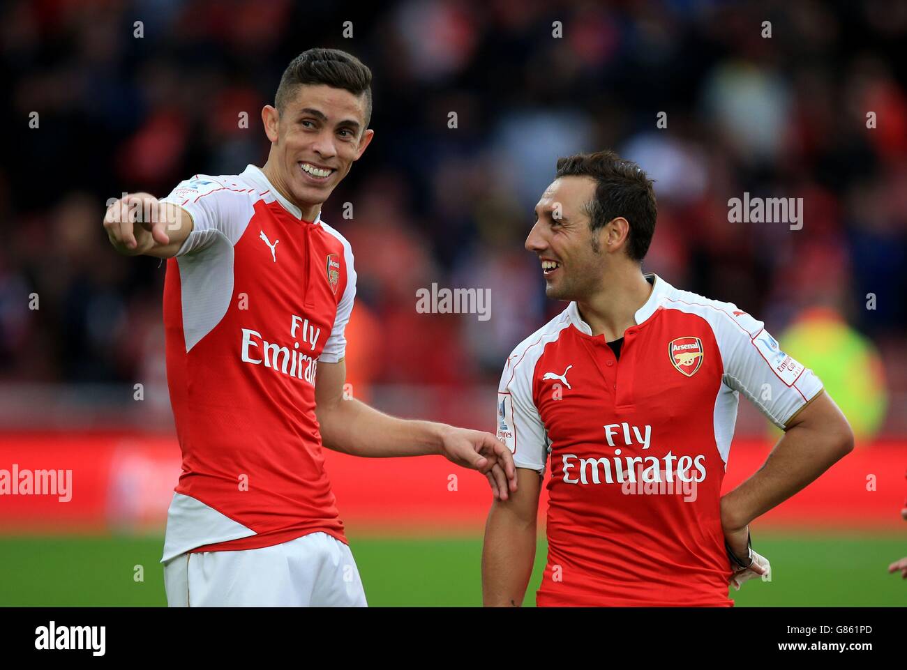 Arsenal's Gabriel (left) and Arsenal's Santi Cazorla (right) have a ...