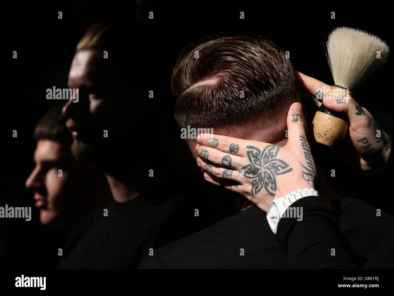 A model's hair is shown off at the Great British Barber Bash, held at ...