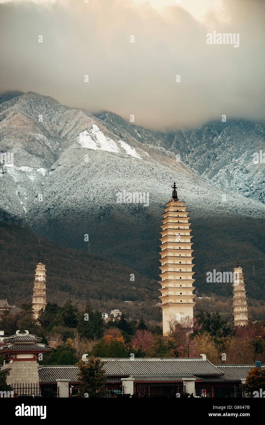 Ancient pagoda in Dali old town with snow capped Mt Cangshan, Yunnan ...