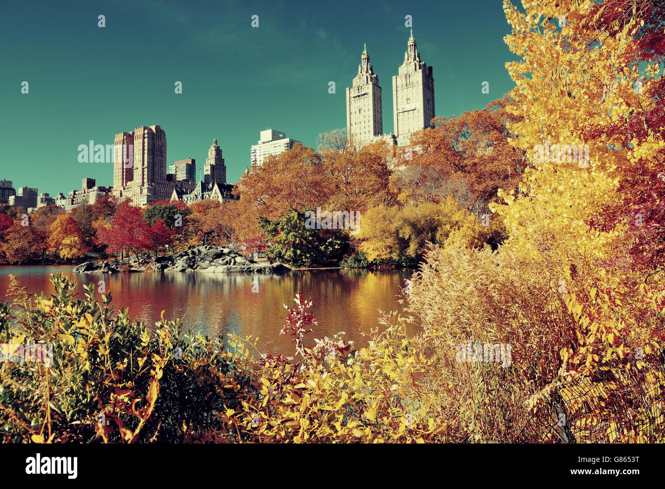 Central Park Autumn and buildings in midtown Manhattan New York City ...