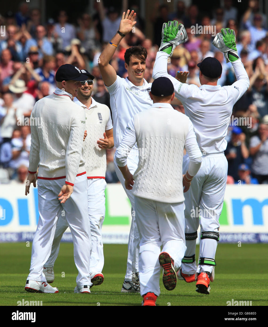 England bowler Steven Finn celebrates taking wicket of Australia' Peter ...