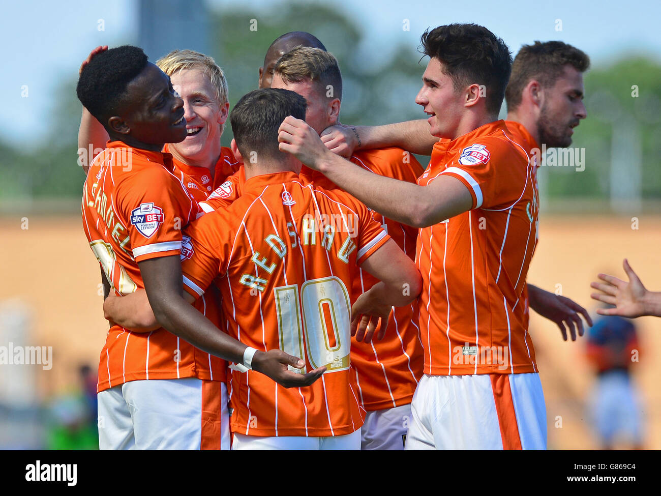 Blackpool's Mark Cullen (second left, behind) celebrates with his ...
