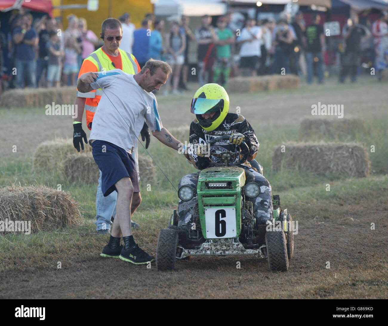 A competitor encounters a problem with his mower at the start of the ...
