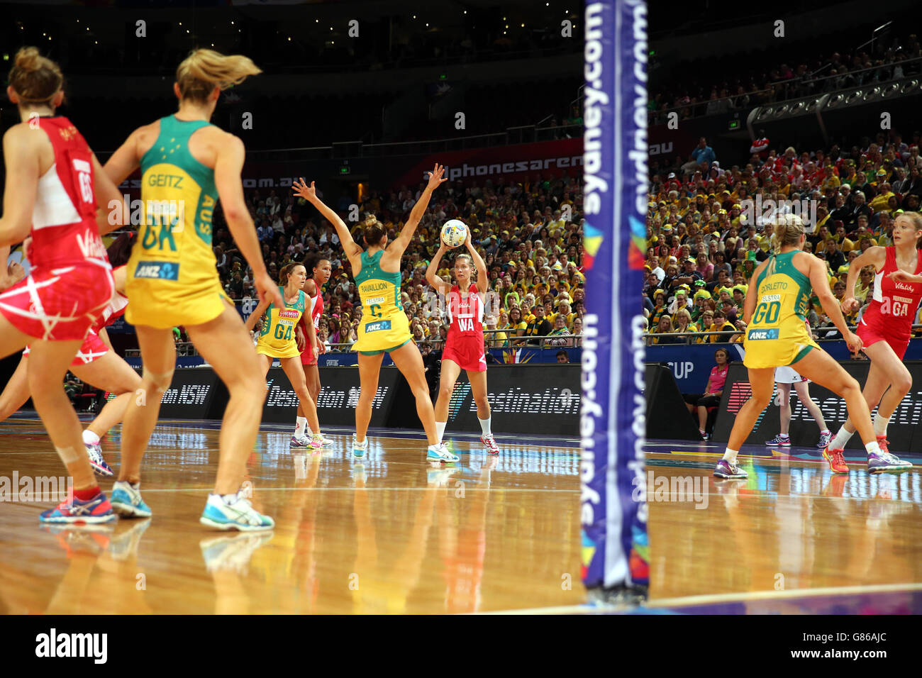 England's Tamsin Greenway looks to pass under pressure from Australia's ...