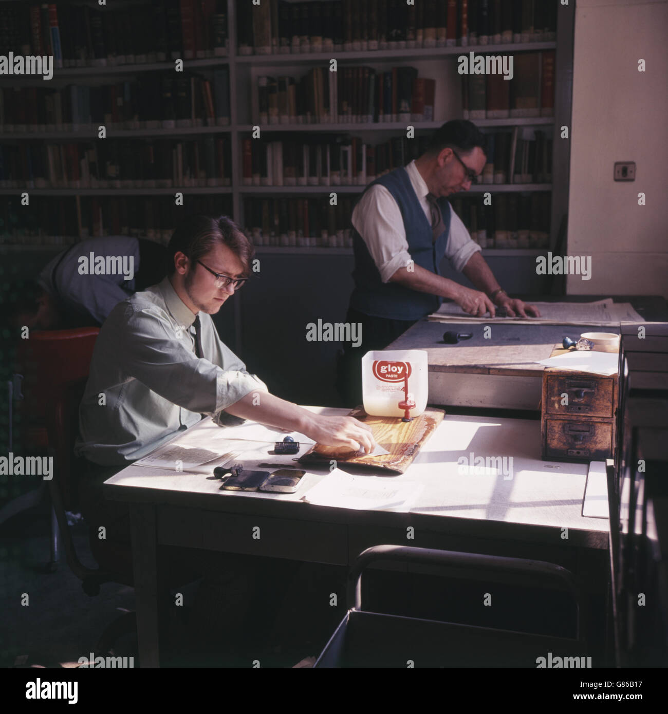 Images of librarians and researchers at work in the Press Association ...