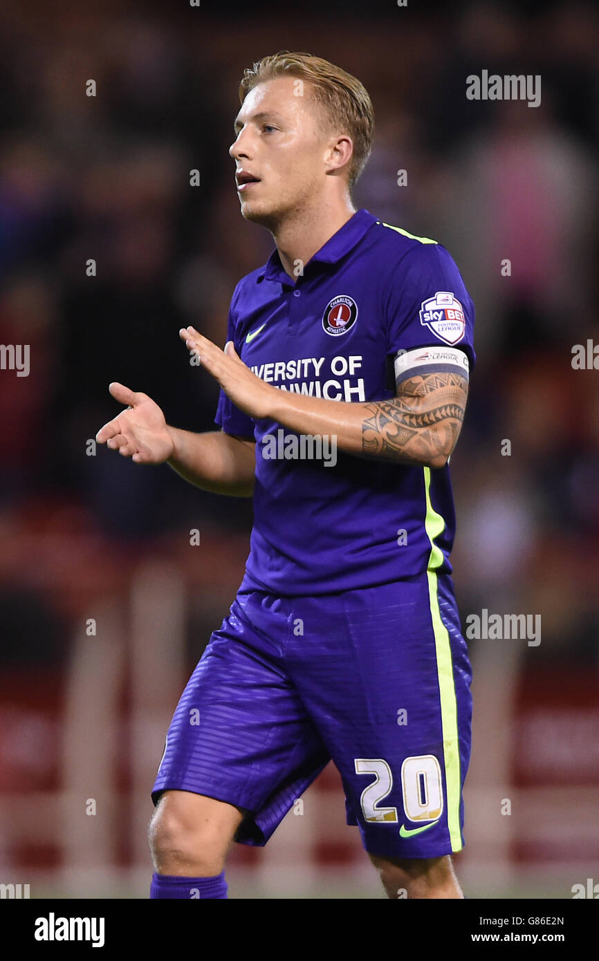 Charlton Athletic captain Chris Solly applauds the traveling fans after ...
