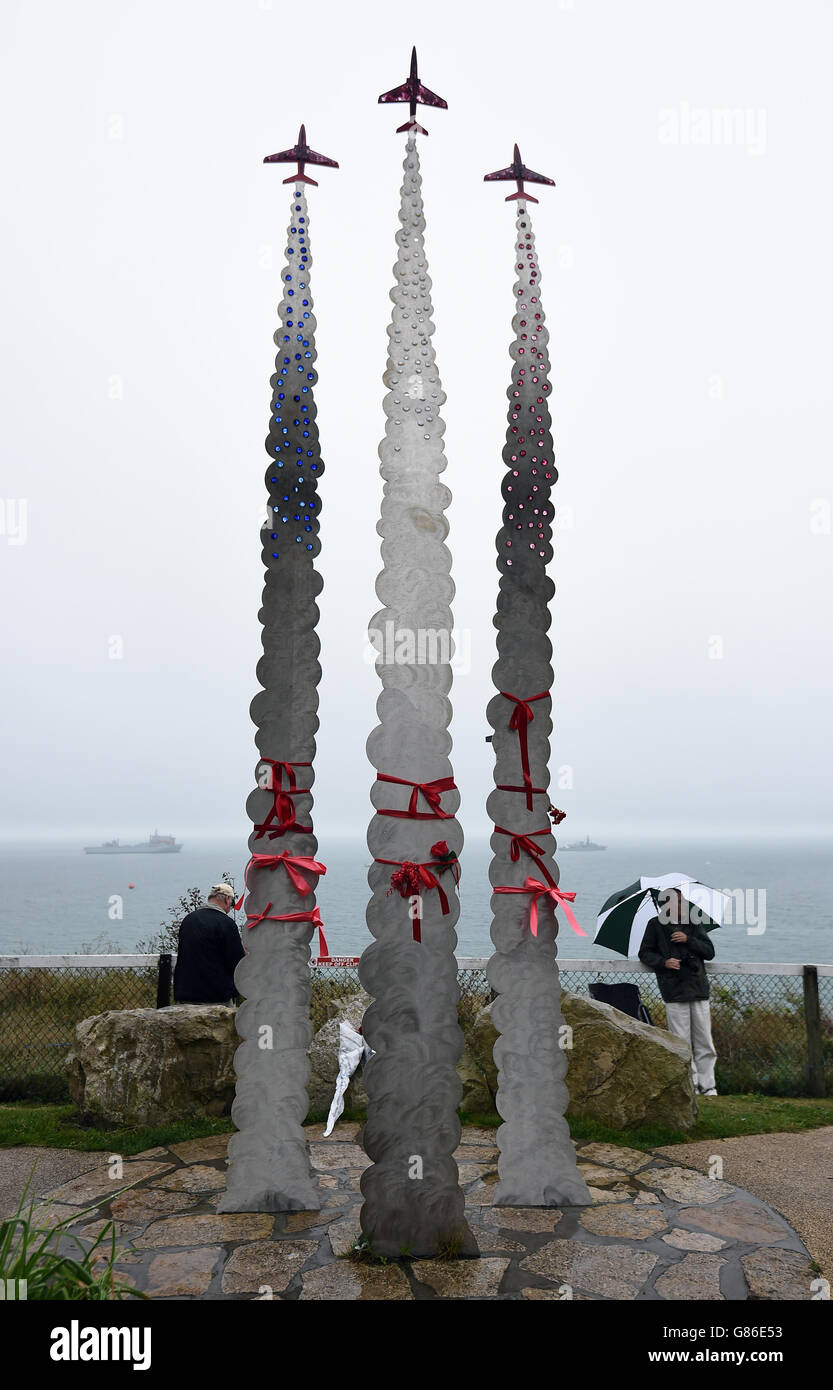 Red ribbons are tied around the Jon Egging Red Arrows memorial on the ...