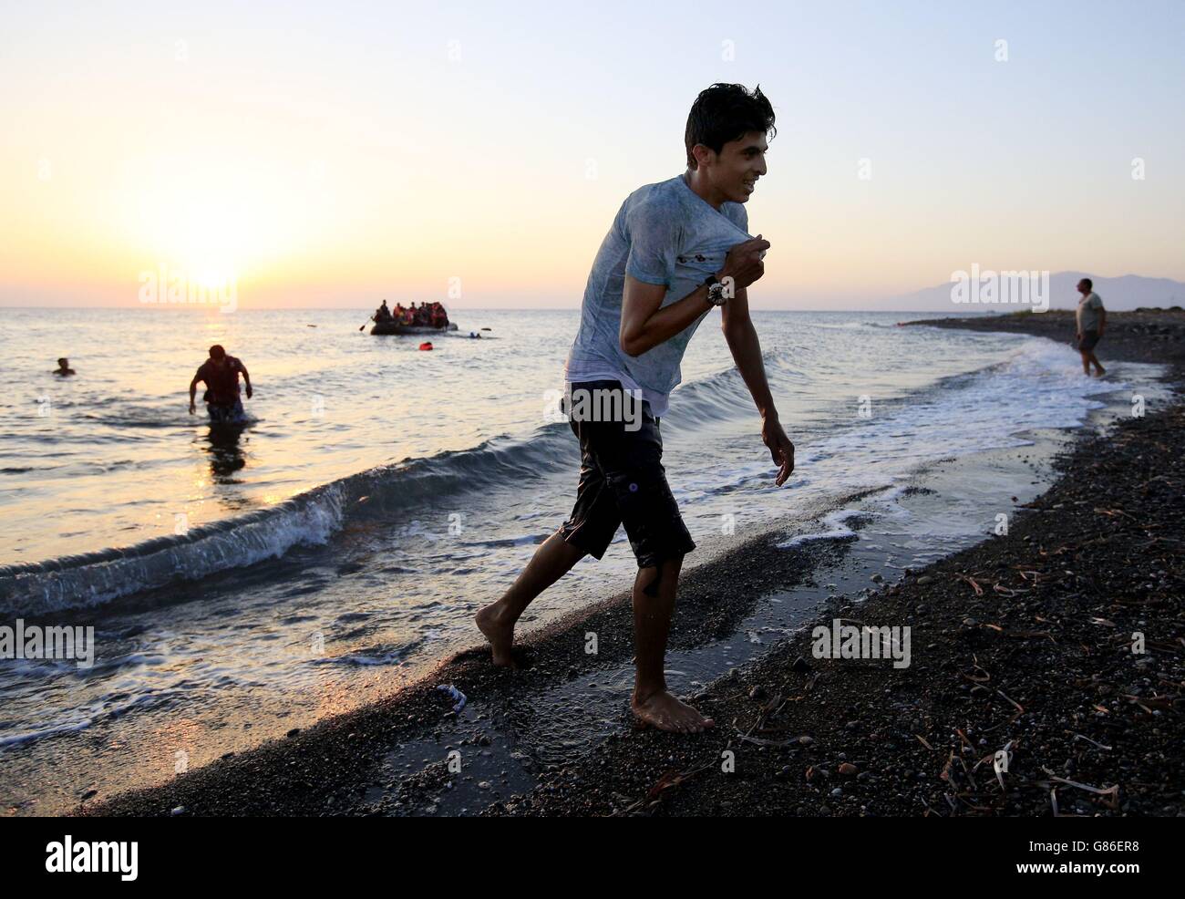 Migrants and refugees arrive on the beach at Psalidi near Kos Town, Kos ...