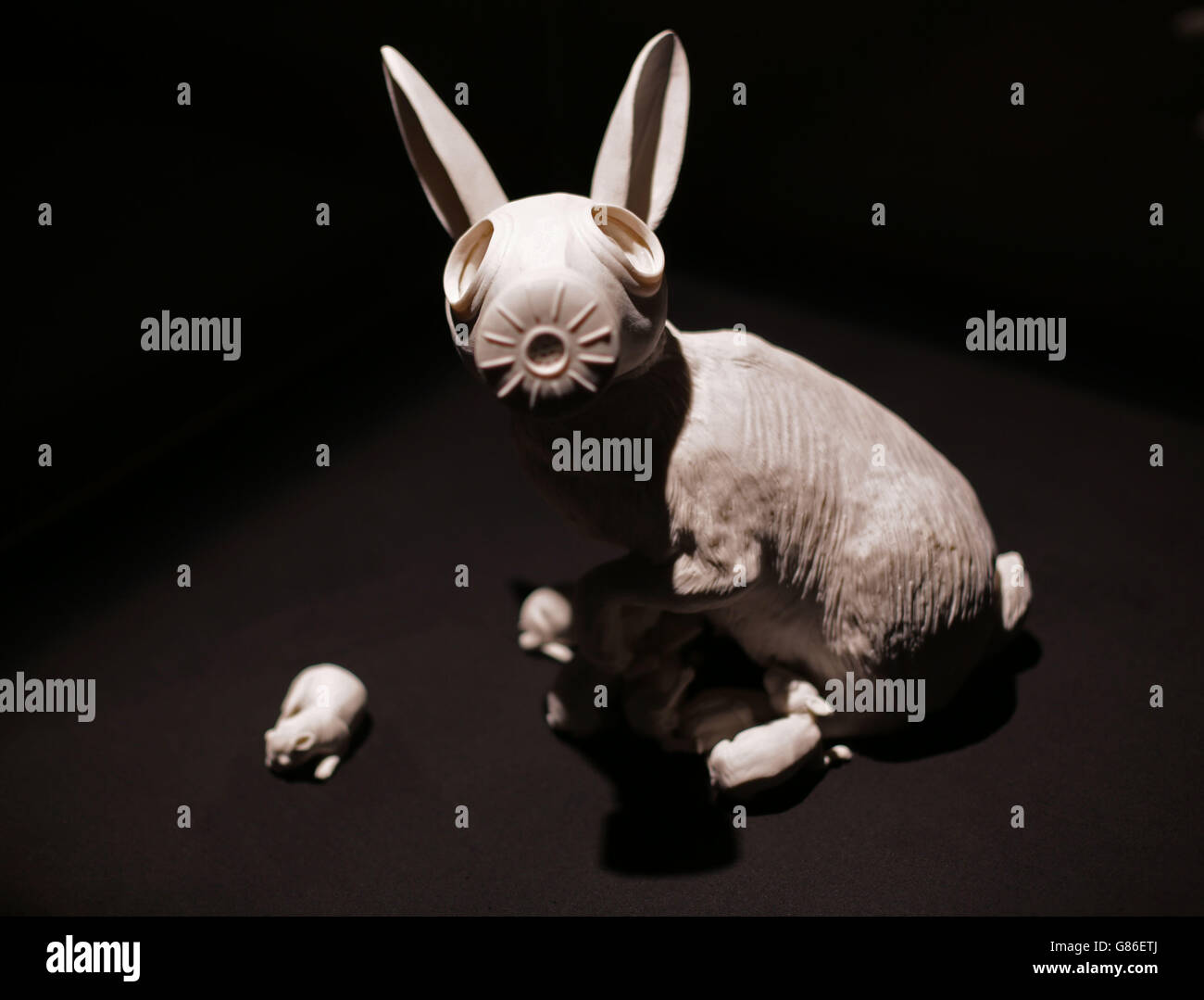 A piece featuring a rabbit wearing a gas mask on display during the ...