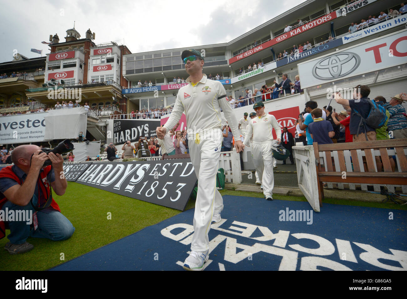 Australia captain Michael Clarke leads out his players for the final ...