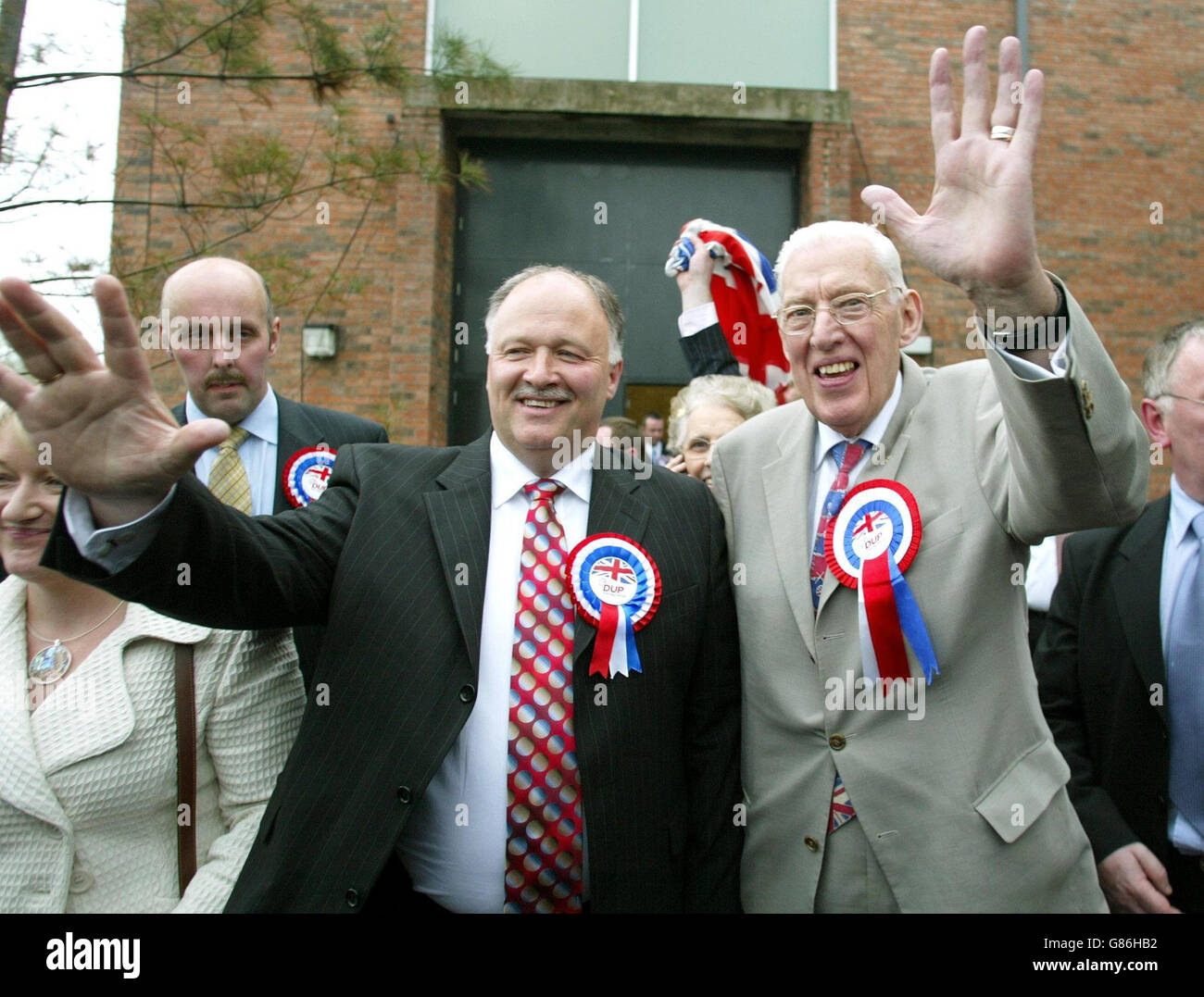 Rosette posing smiling half length northern ireland waving hi-res stock ...