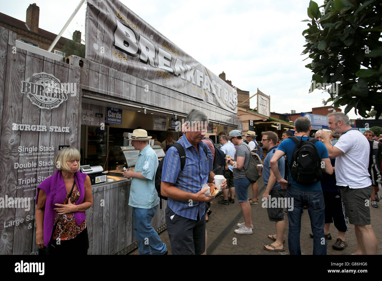Cricket fans purchase breakfast before the day's play Stock Photo - Alamy