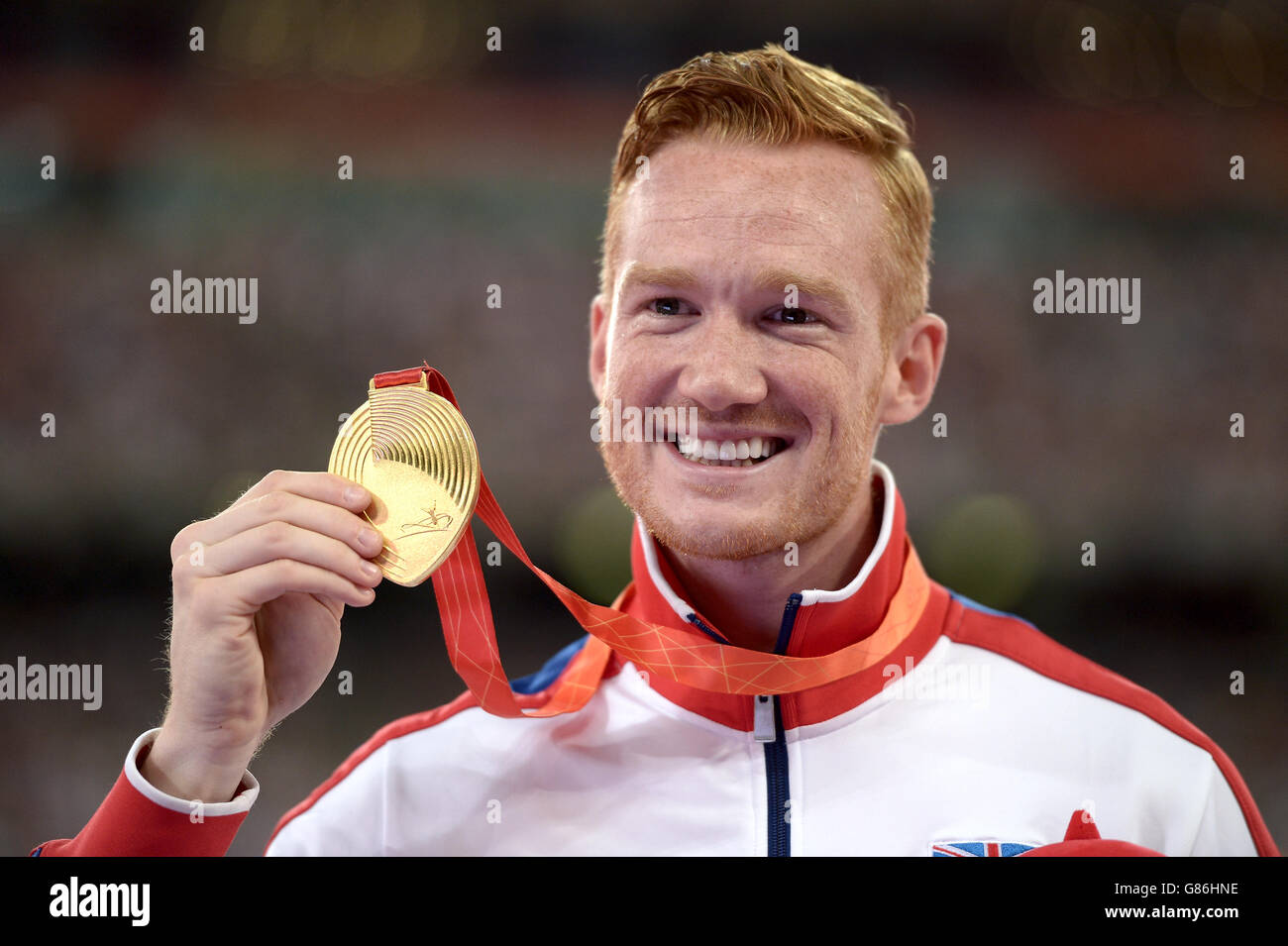 Great Britain's Greg Rutherford receives his Gold medal during the men ...