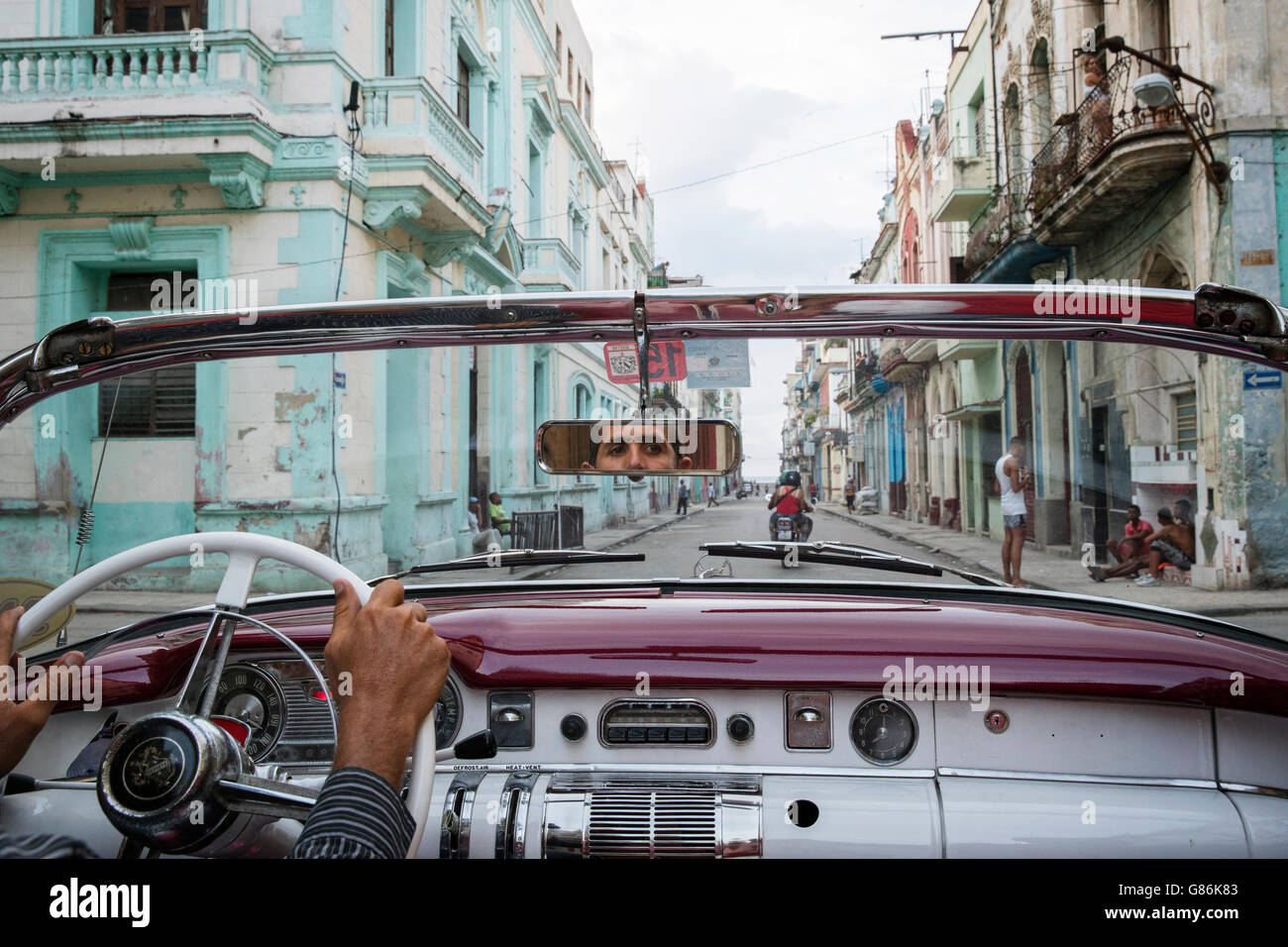 Driving a classic car in Havana, Cuba Stock Photo - Alamy