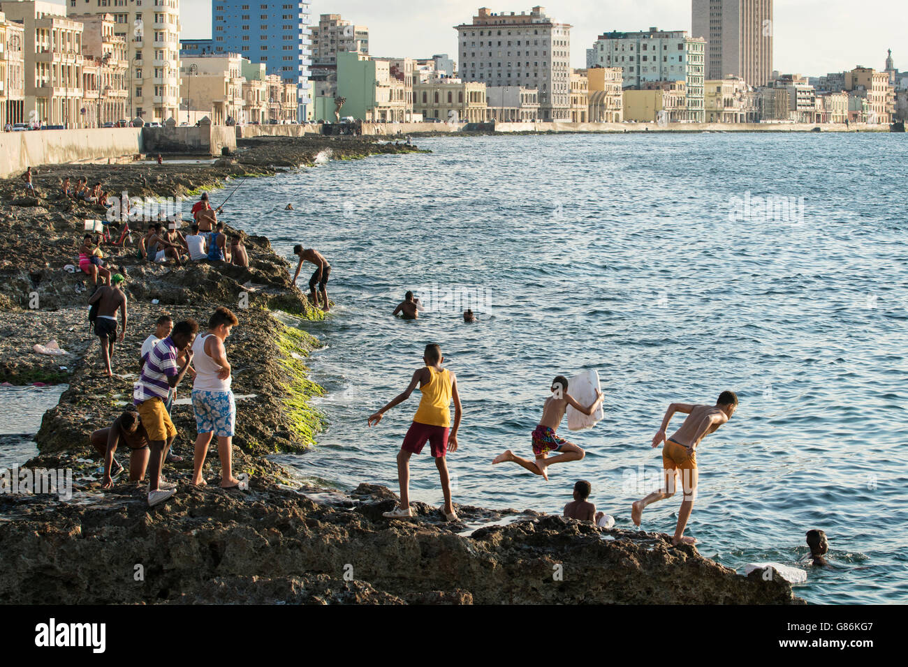 Boy Jumping Off Rocks High Resolution Stock Photography and Images - Alamy