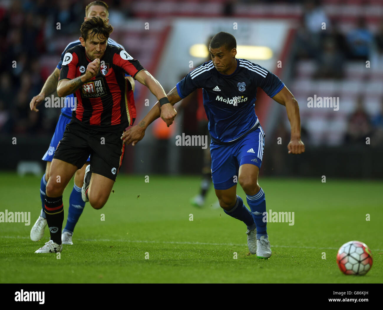 Bournemouth's Charlie Daniels (left) and Cardiff City's Lee Peltier ...