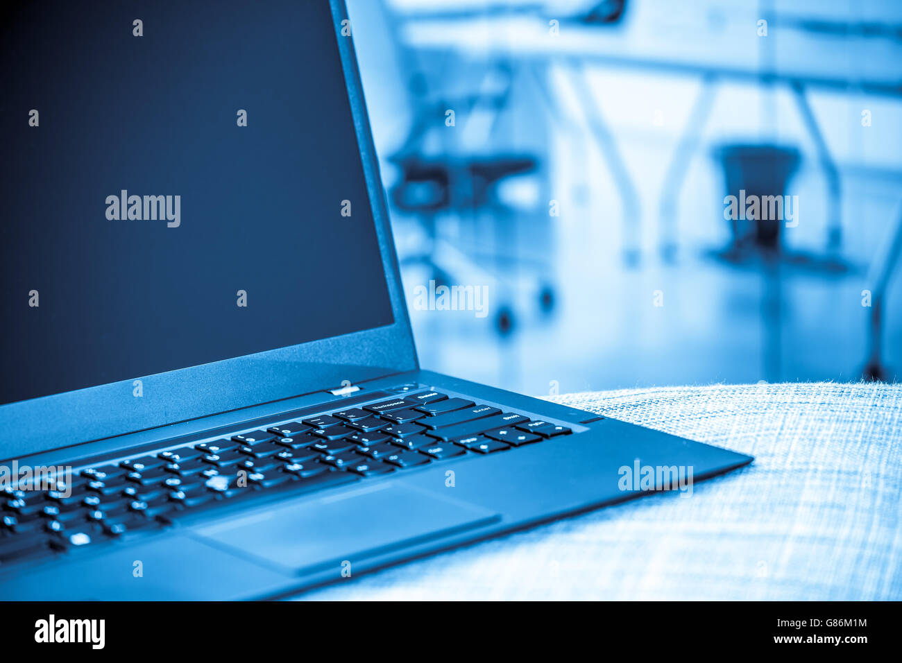 Notebook Close up in blue tone Stock Photo - Alamy