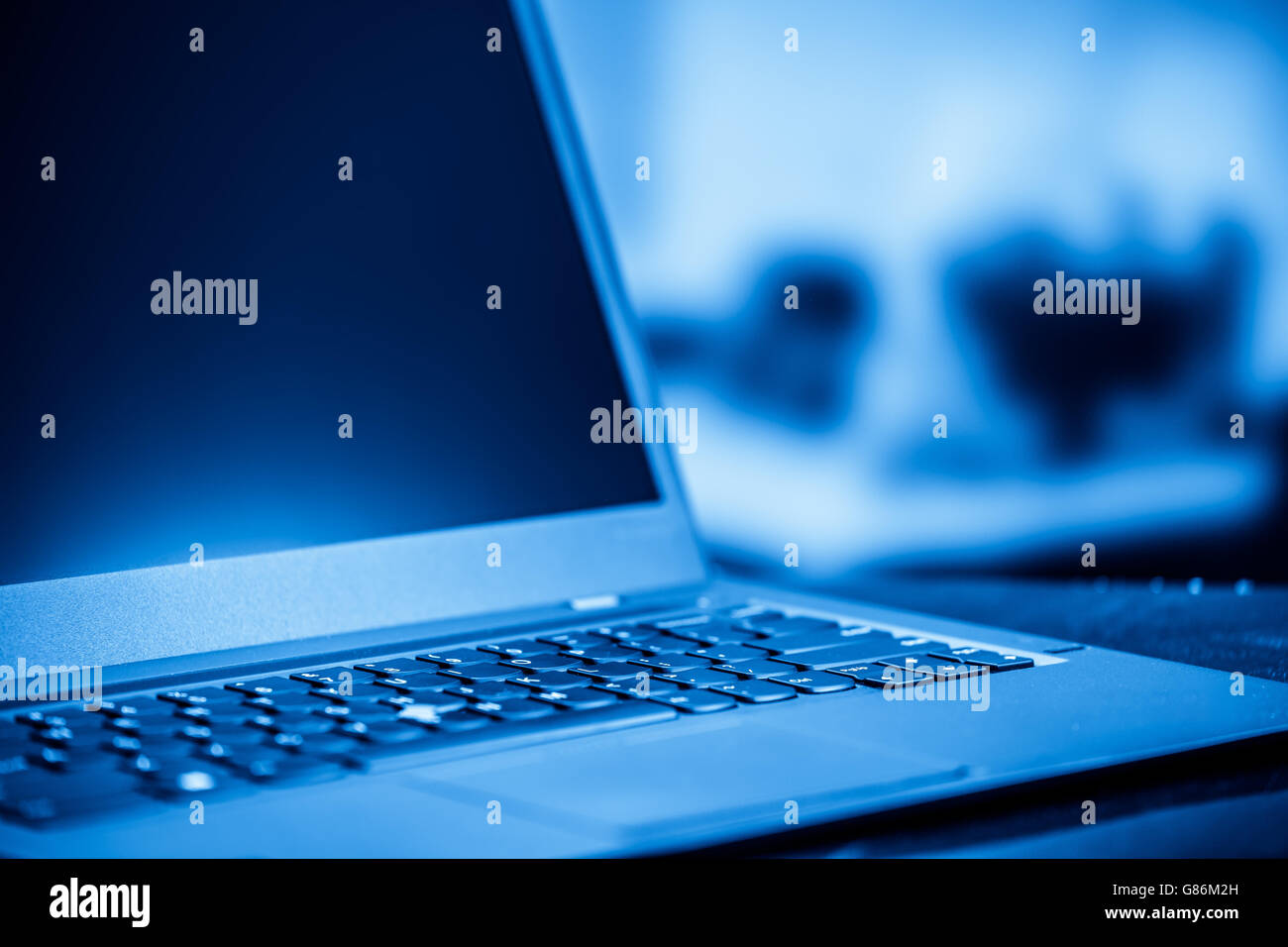 Notebook Close up in blue tone Stock Photo - Alamy
