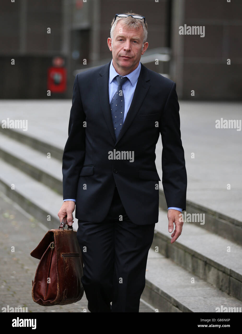 Dr Gerard McKaig leaves Glasgow Sheriff court after giving evidence in ...