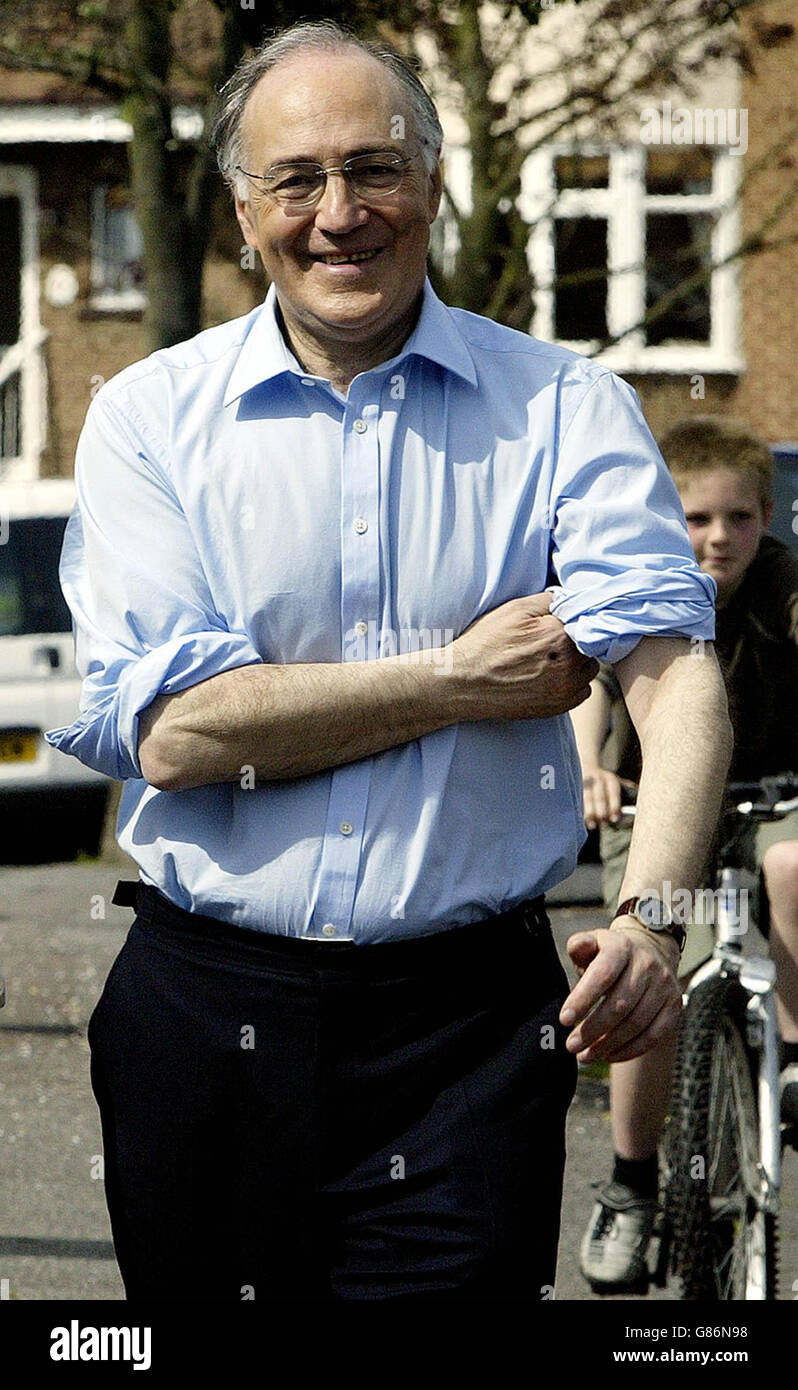 The leader of the Conservative party Michael Howard rolls up his ...