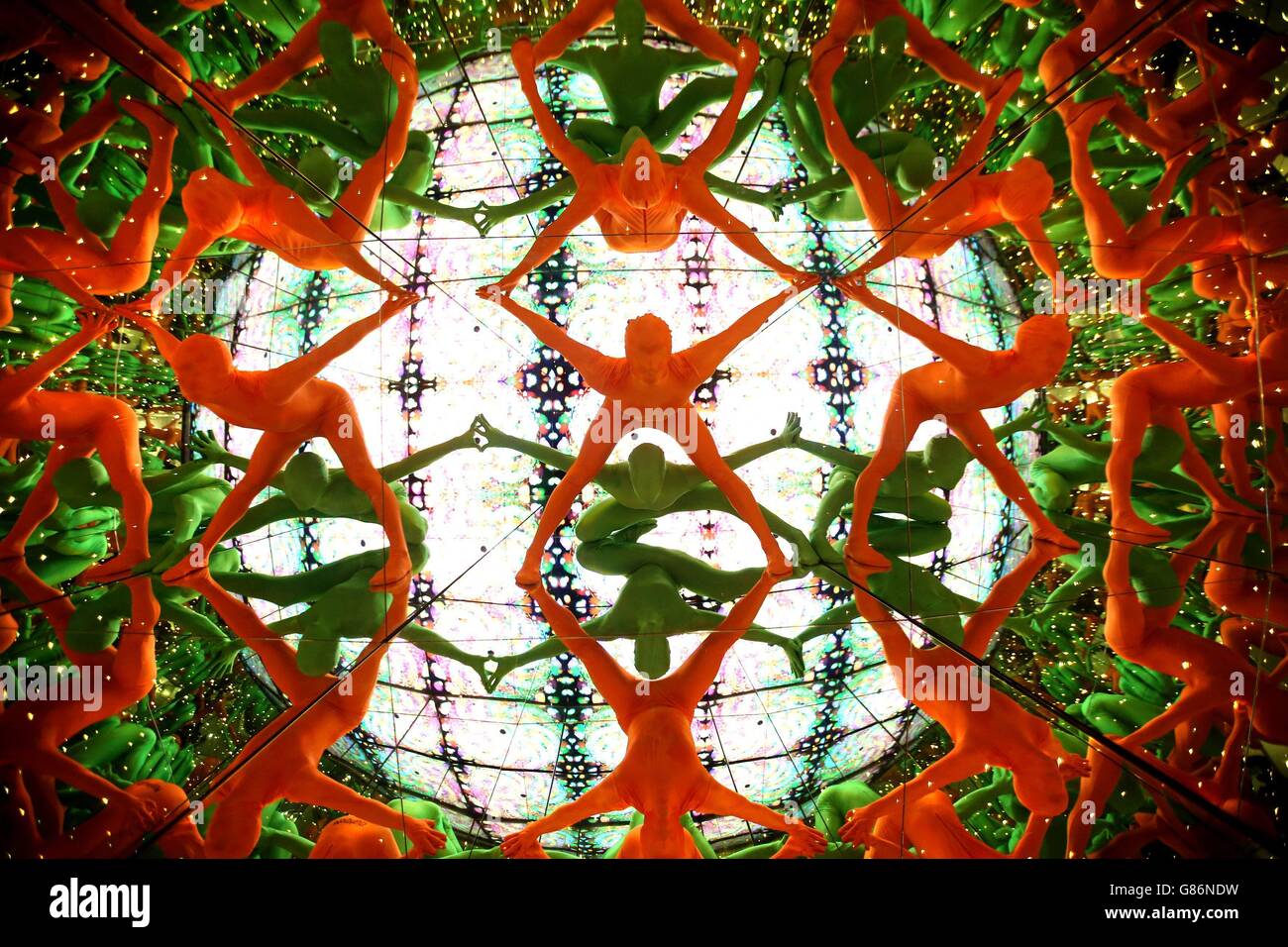 Morph-suited performers David Labanca (orange suit) and Gianmarco ...