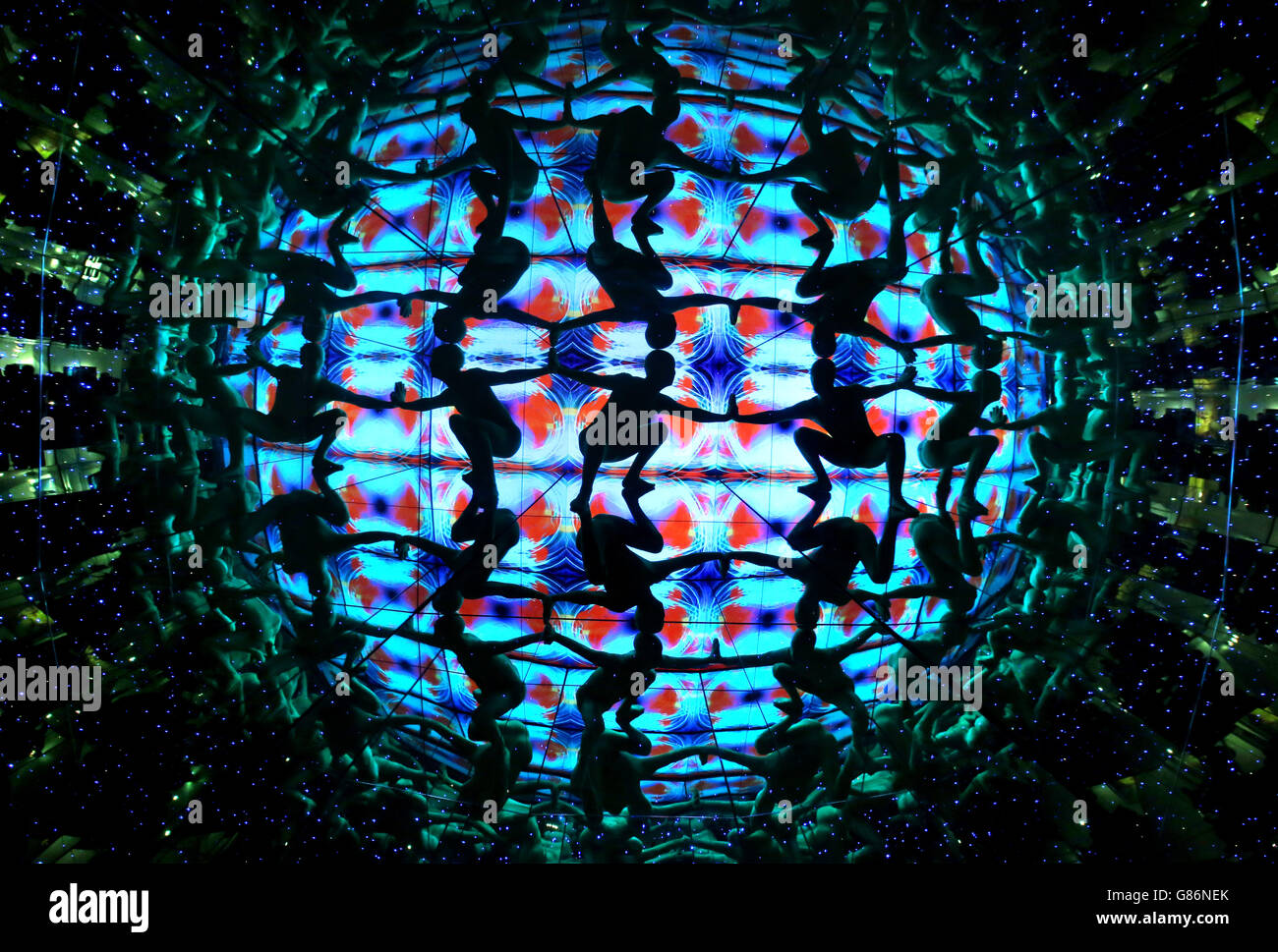 Morph-suited performers David Labanca (orange suit) and Gianmarco ...