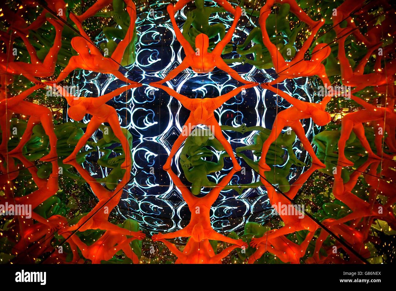 Morph-suited performers David Labanca (orange suit) and Gianmarco ...