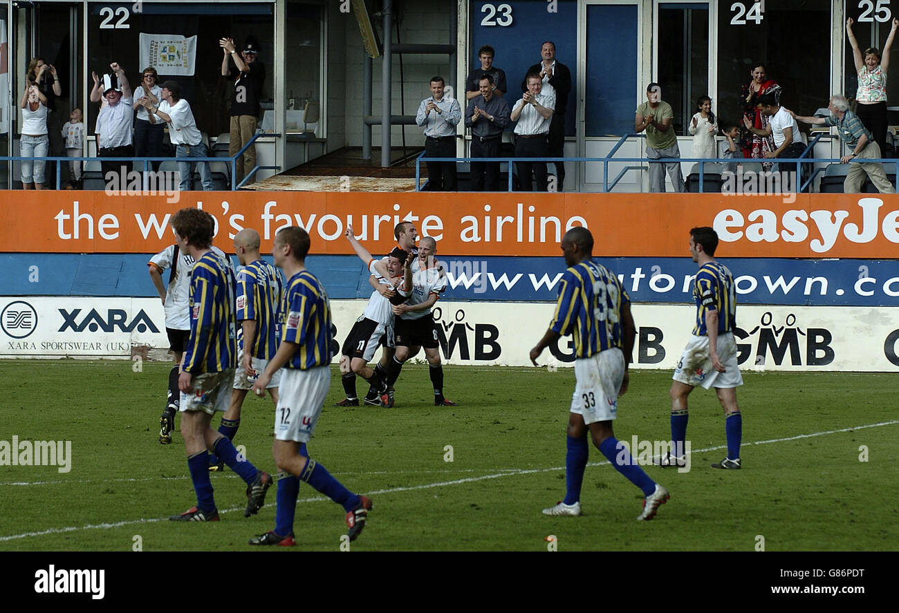 Luton towns kevin nicholls celebrates with goalscorer steve robinson hi ...