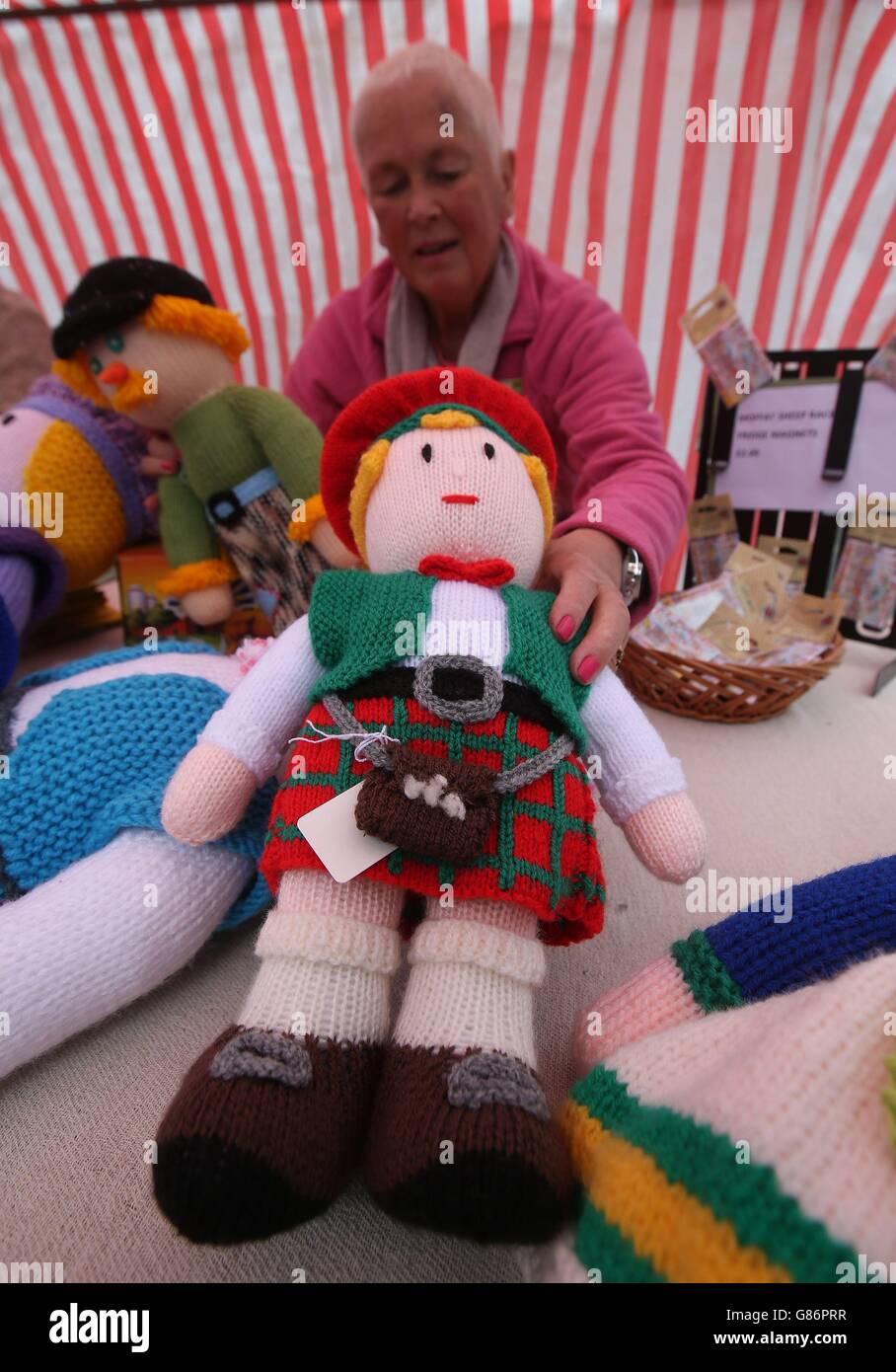 Audrey Sherwin at a stall with knitted woollen jockeys as sheep prepare ...