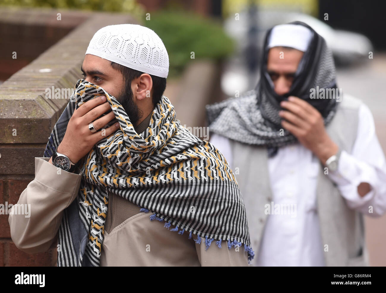 Mohammed Waqar, 23, (left) and his father Mohammed Siddique, 60, arrive ...